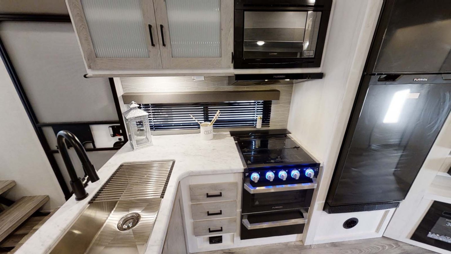 This Luxury 5th Wheel Kitchen is Spacious & Modern